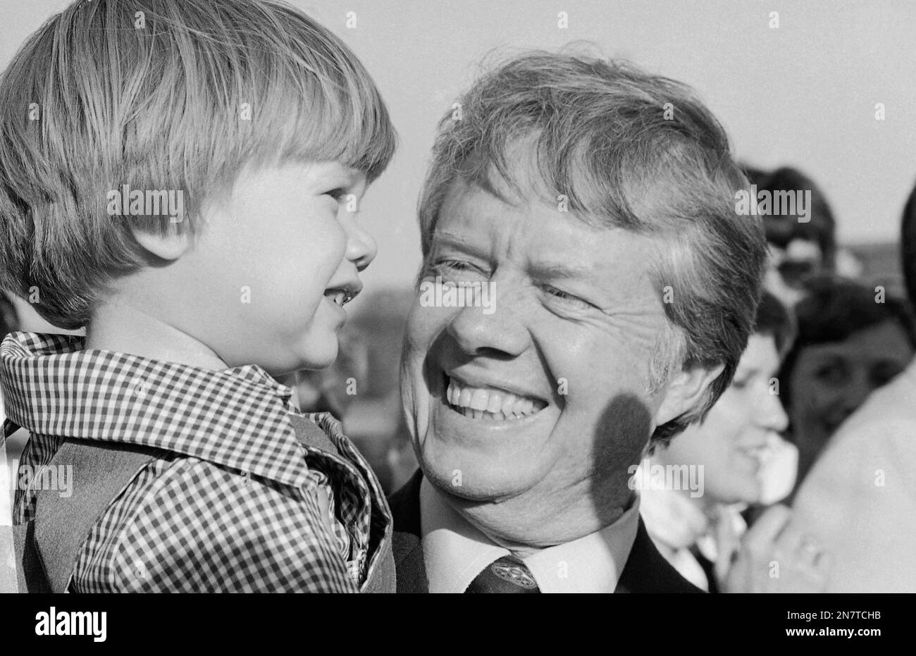 "Show 'em how grandpa smiles," President Jimmy Carter told his grandson ...