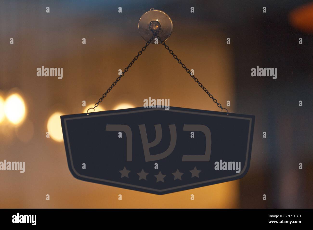 Sign in a window with written in Yiddish “כשר”, meaning “kosher” Stock ...