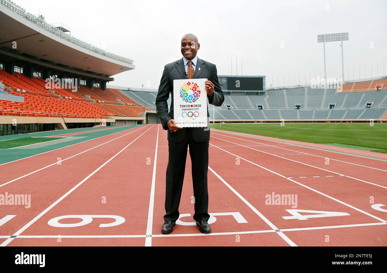 U.S. Olympian Carl Lewis stands in the spot where he won the 100-meter ...