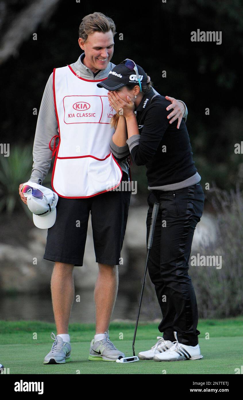 Beatriz Recari, of Spain, right, is congratulated by her caddie Andreas ...