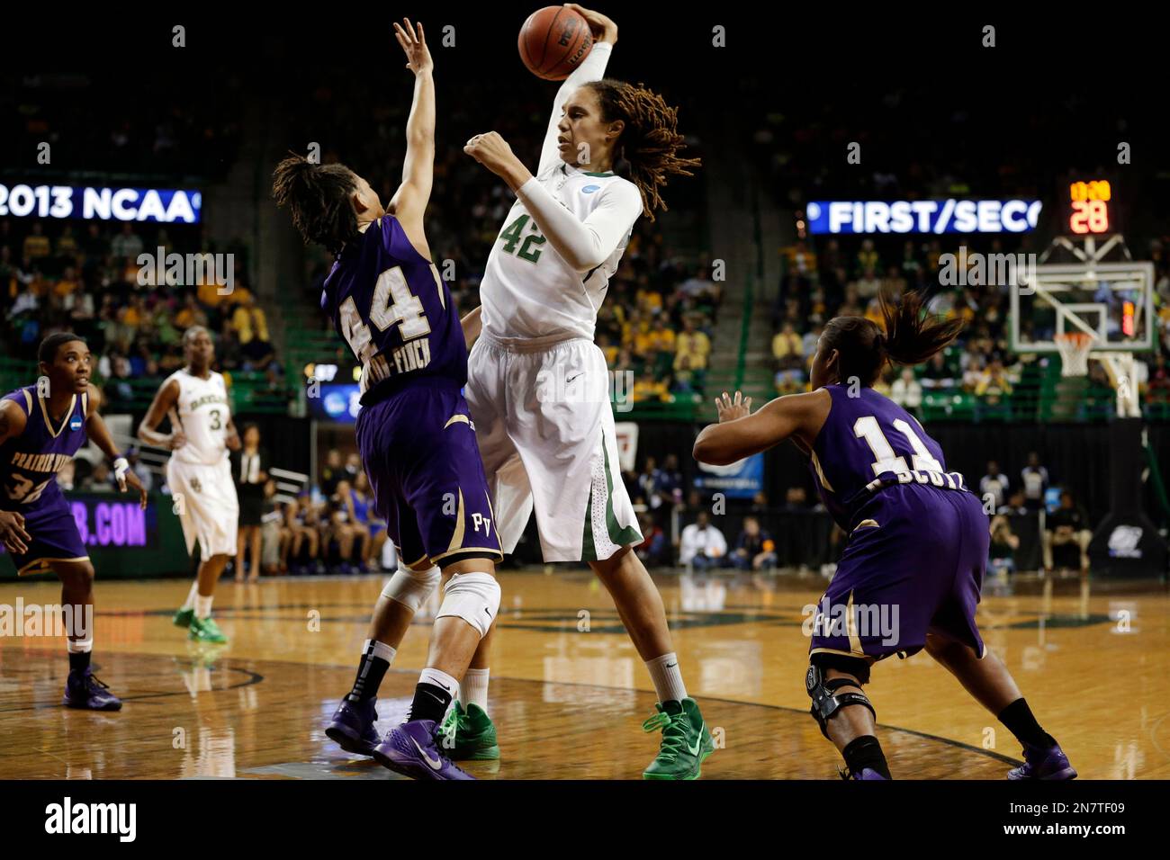 Baylor's Brittney Griner (42) holds the ball out of the reach of ...