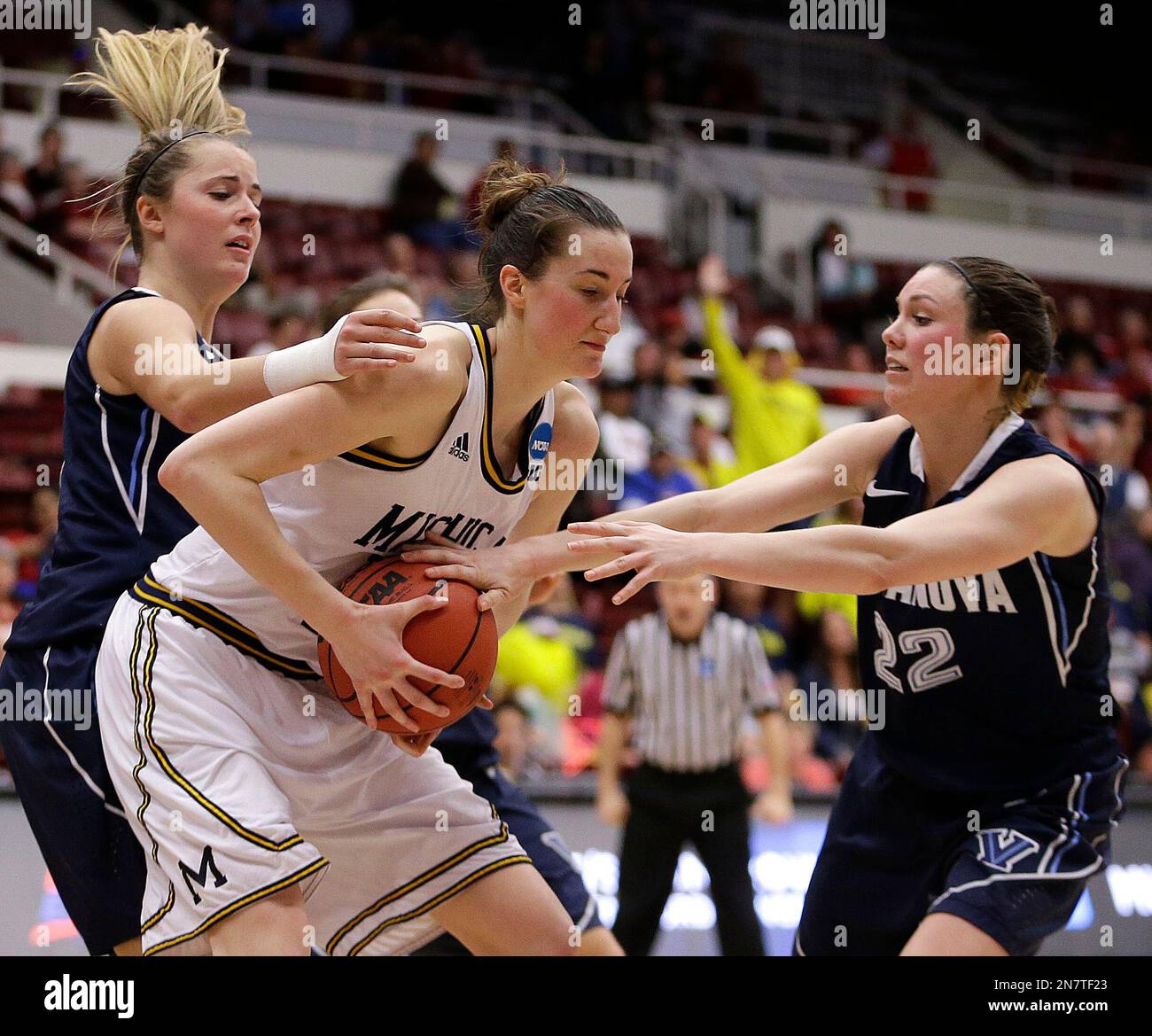 Villanova's Caroline Coyer, left, and Devon Kane (22) pressure Michigan ...