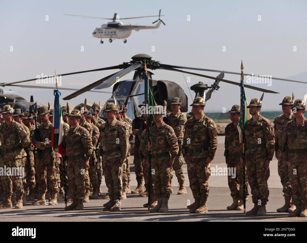Soldiers of the Italian Alpine Brigade Taurinense line up as Italian ...