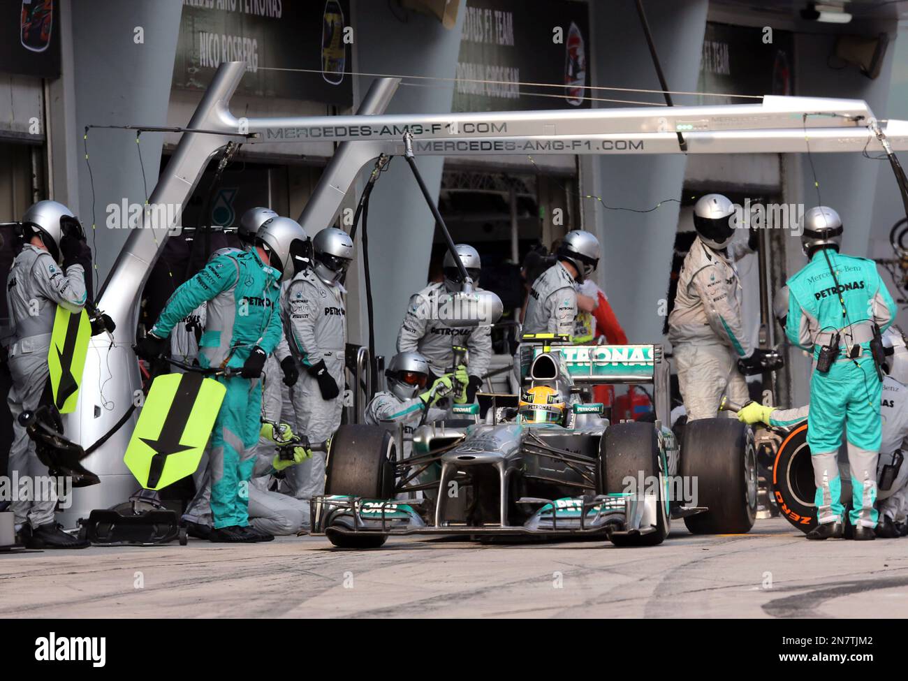 Mercedes driver Lewis Hamilton of Britain stops for a pit stop during ...