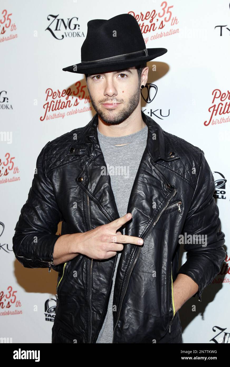 Singer Travis Garland arrives at Perez Hilton's Pajama Birthday Party ...