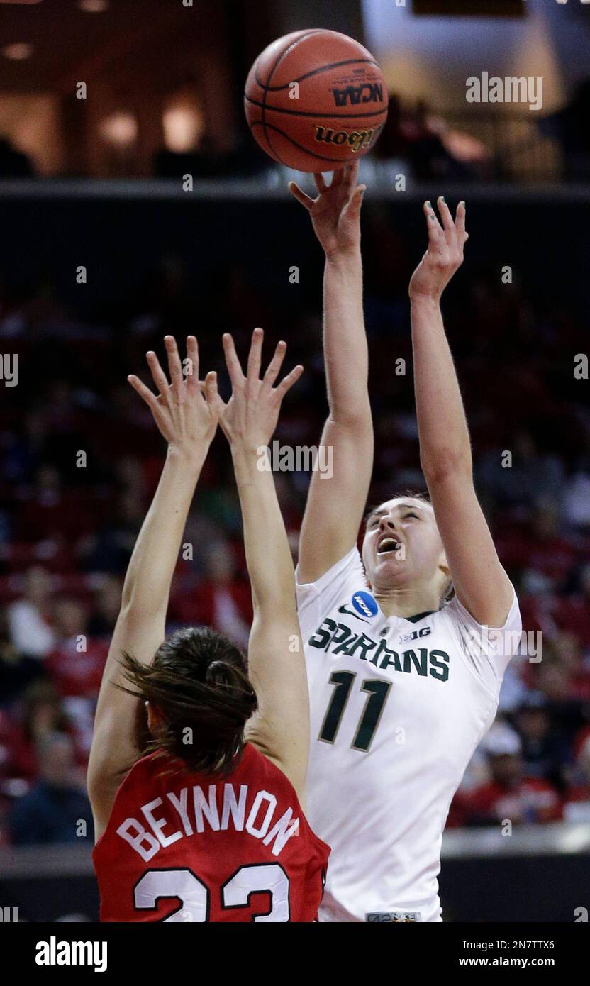 Michigan State forward Annalise Pickrel (11) shoots over Marist's ...