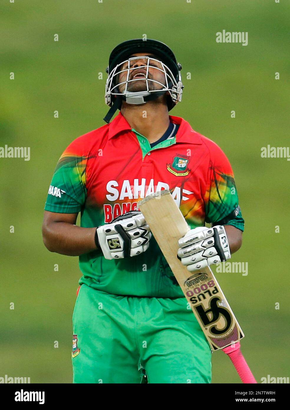 Bangladeshi cricketer Tamim Iqbal celebrates after scoring a century ...