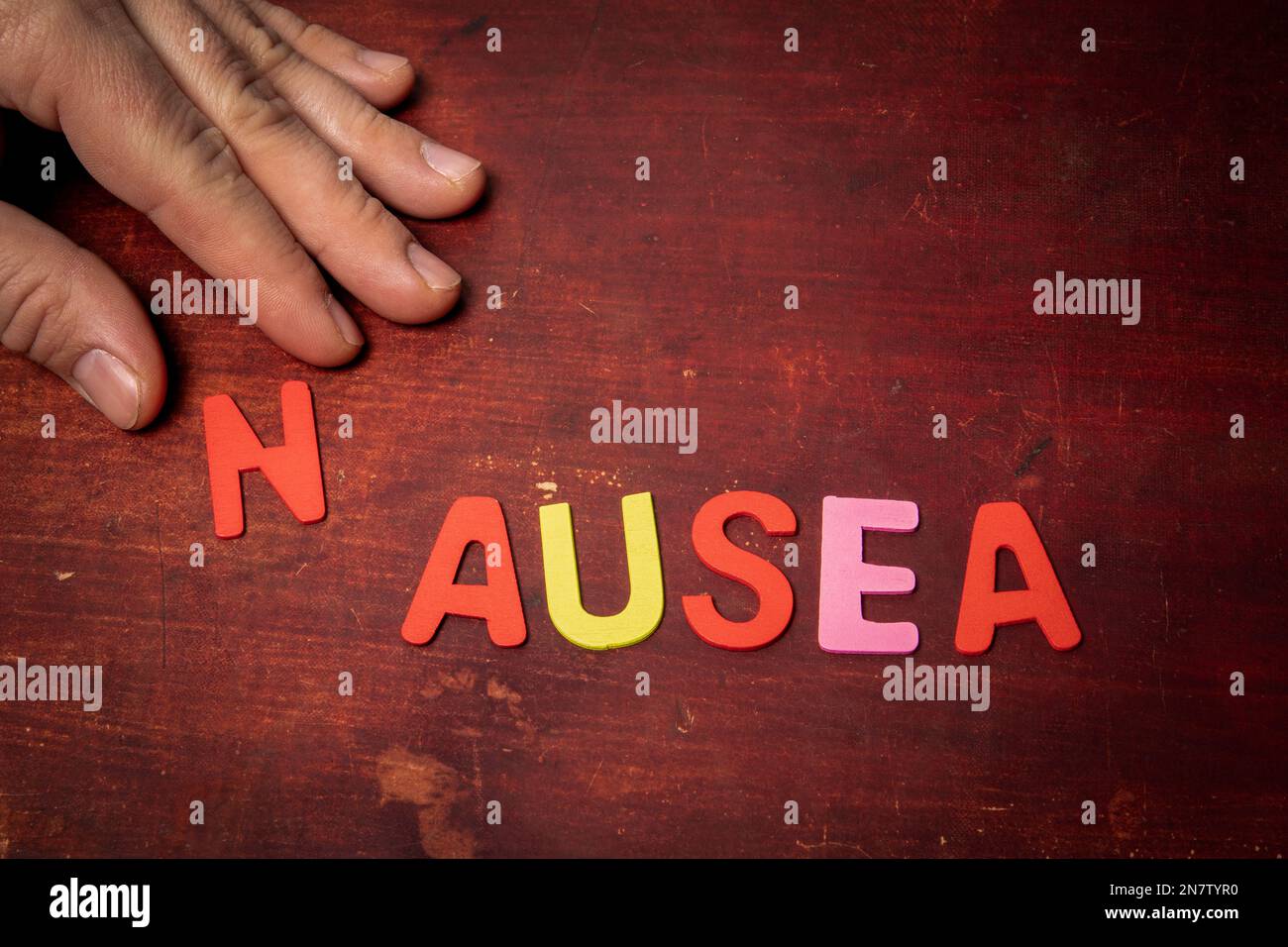 NAUSEA. Health Concept. Colorful text on wood texture background Stock ...