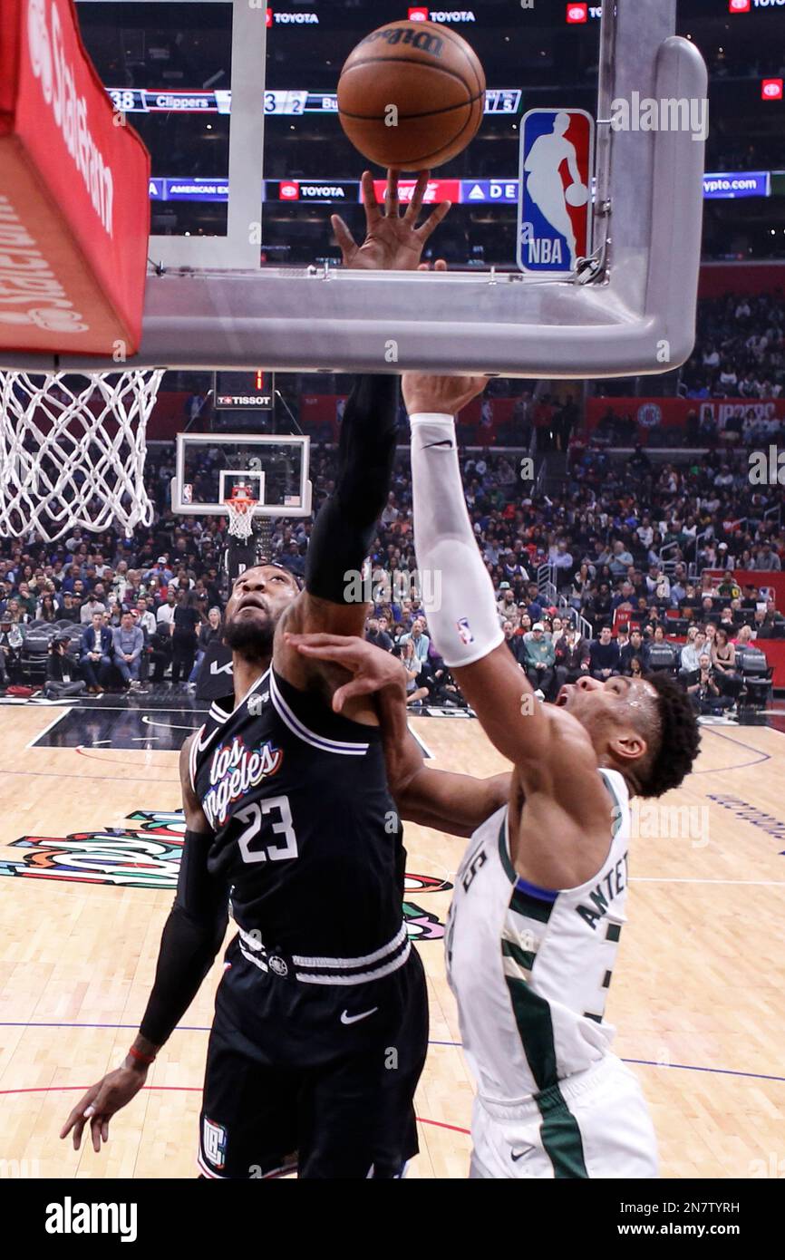 Los Angeles Clippers forward Robert Covington (L) seen in action ...