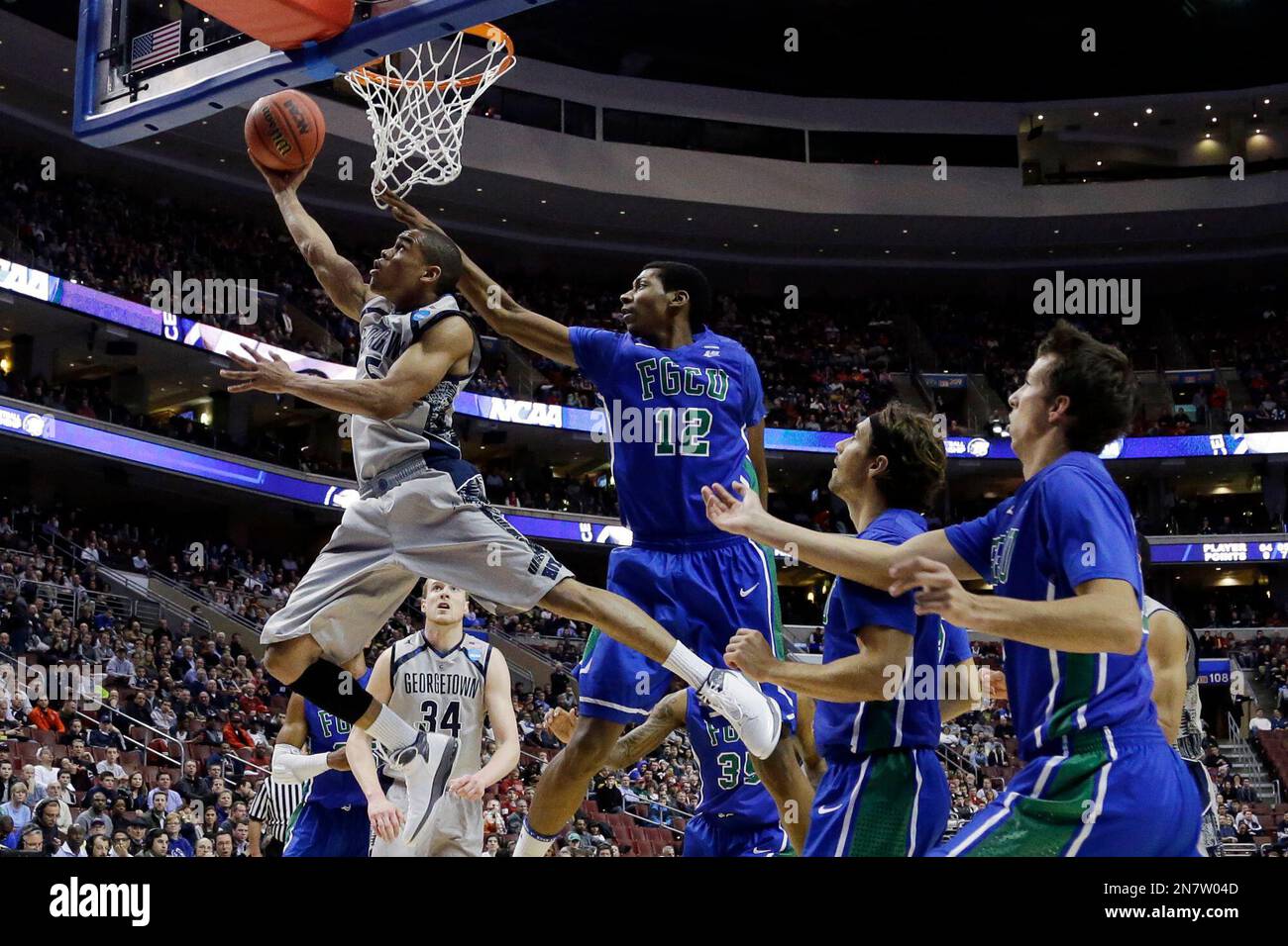 Georgetown's Markel Starks (5) shoots against Florida Gulf Coast's Eric ...