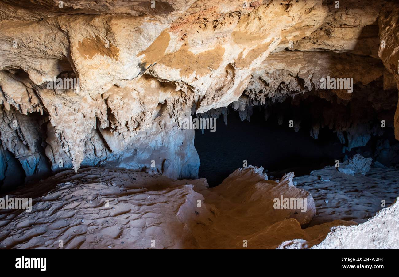 Inside interior of a large underground cave cavern with calcite ...