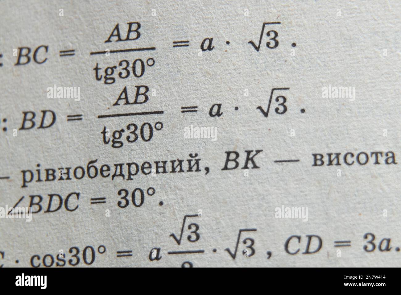 algebra equation on old book page as background, algebra homework Stock ...