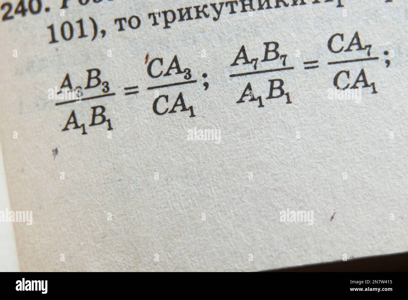 algebra equation on old book page as background, algebra homework Stock ...