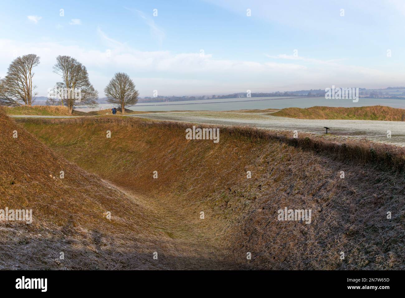 Deep defensive ditch at Old Sarum castle, Salisbury, Wiltshire, England ...
