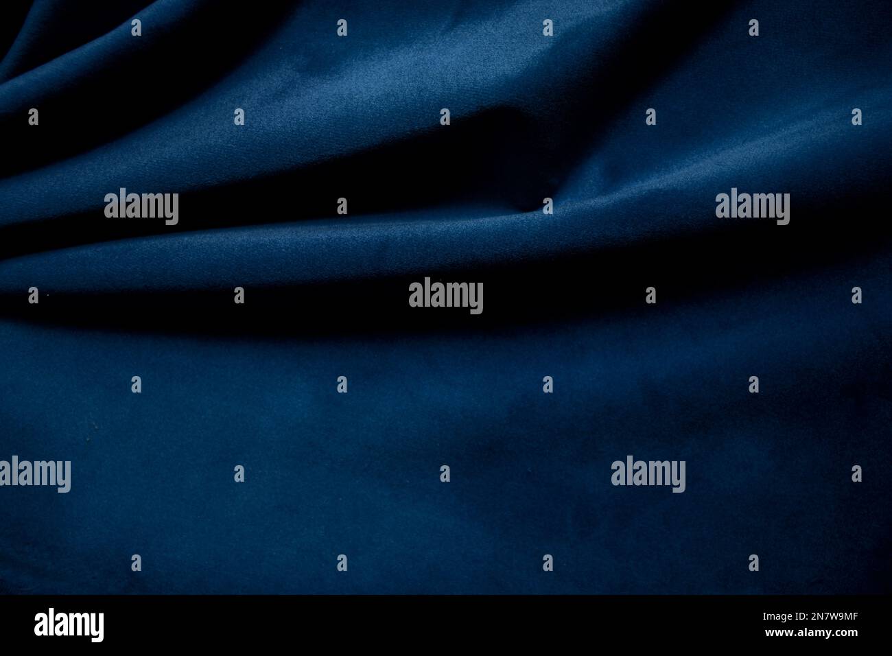 dark blue fabric wrinkled as background close-up Stock Photo - Alamy
