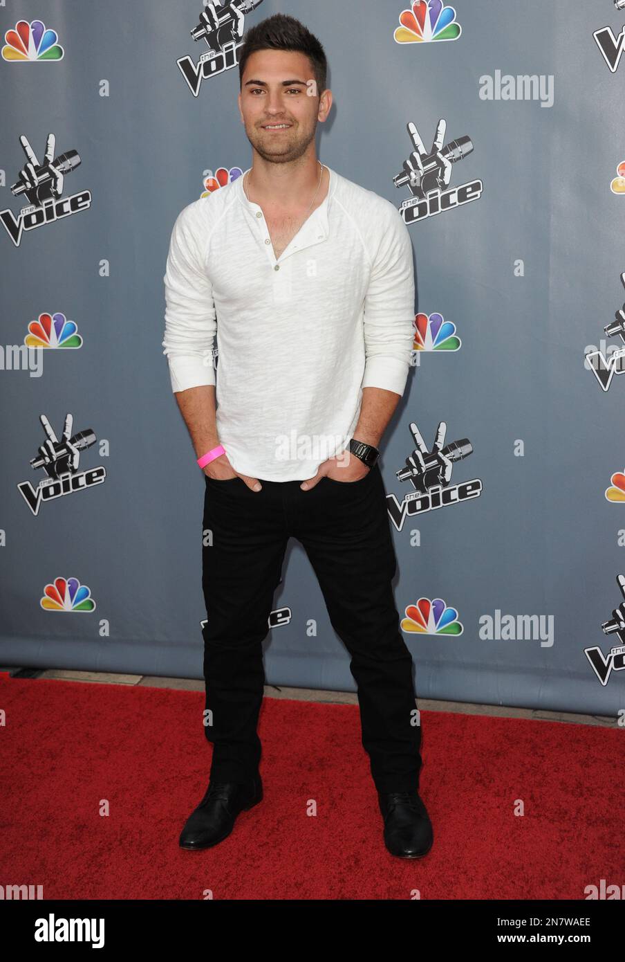 Charlie Rey arrives at the 4th season premiere screening of "The Voice ...
