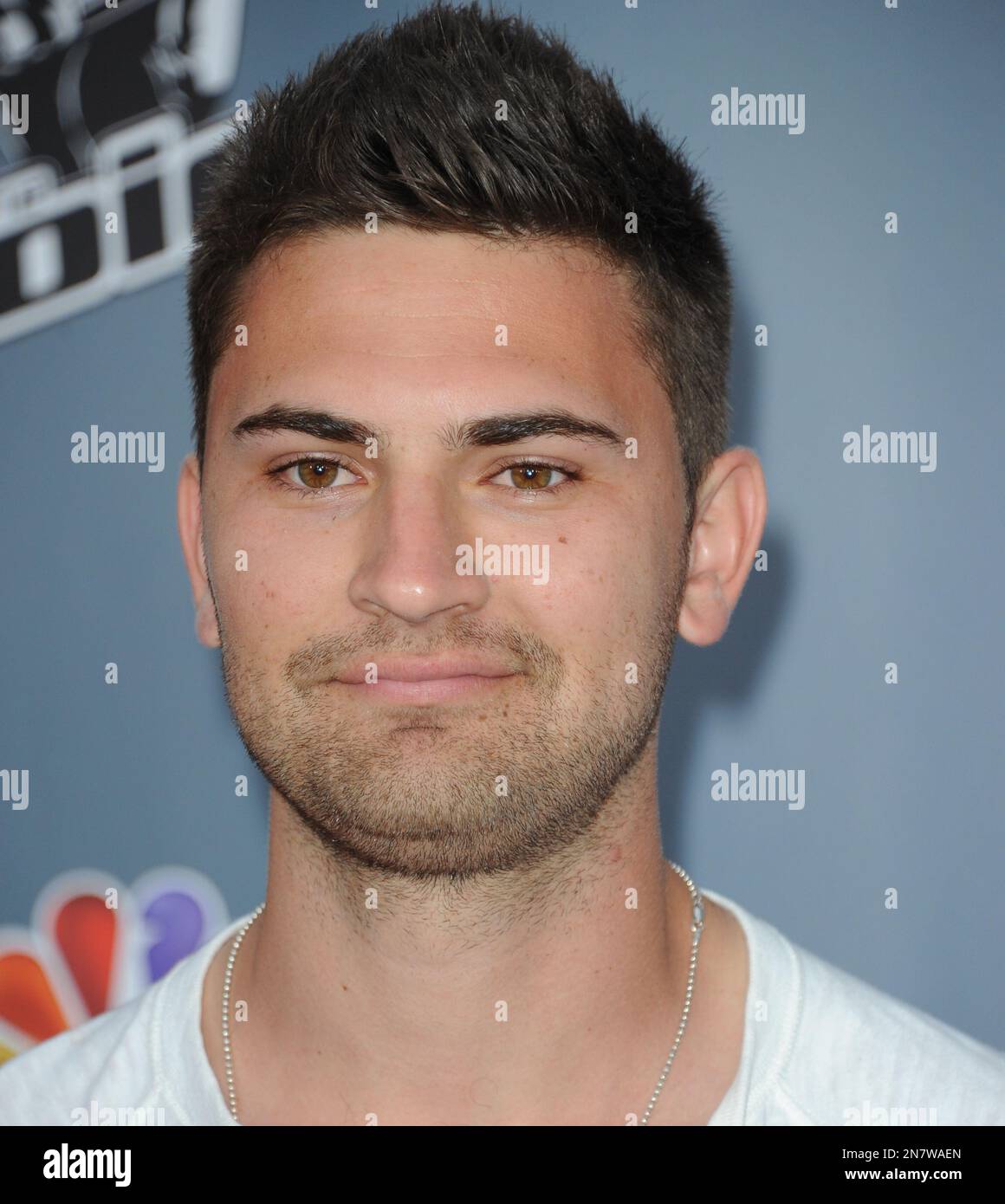 Charlie Rey arrives at the 4th season premiere screening of "The Voice ...