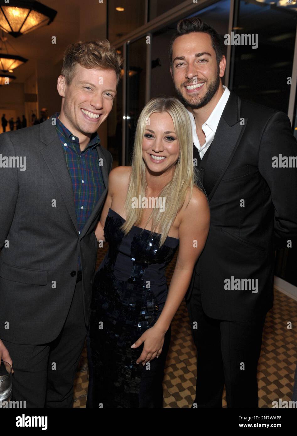 From left, actors Barrett Foa, Kaley Cuoco and Zachary Levi pose ...
