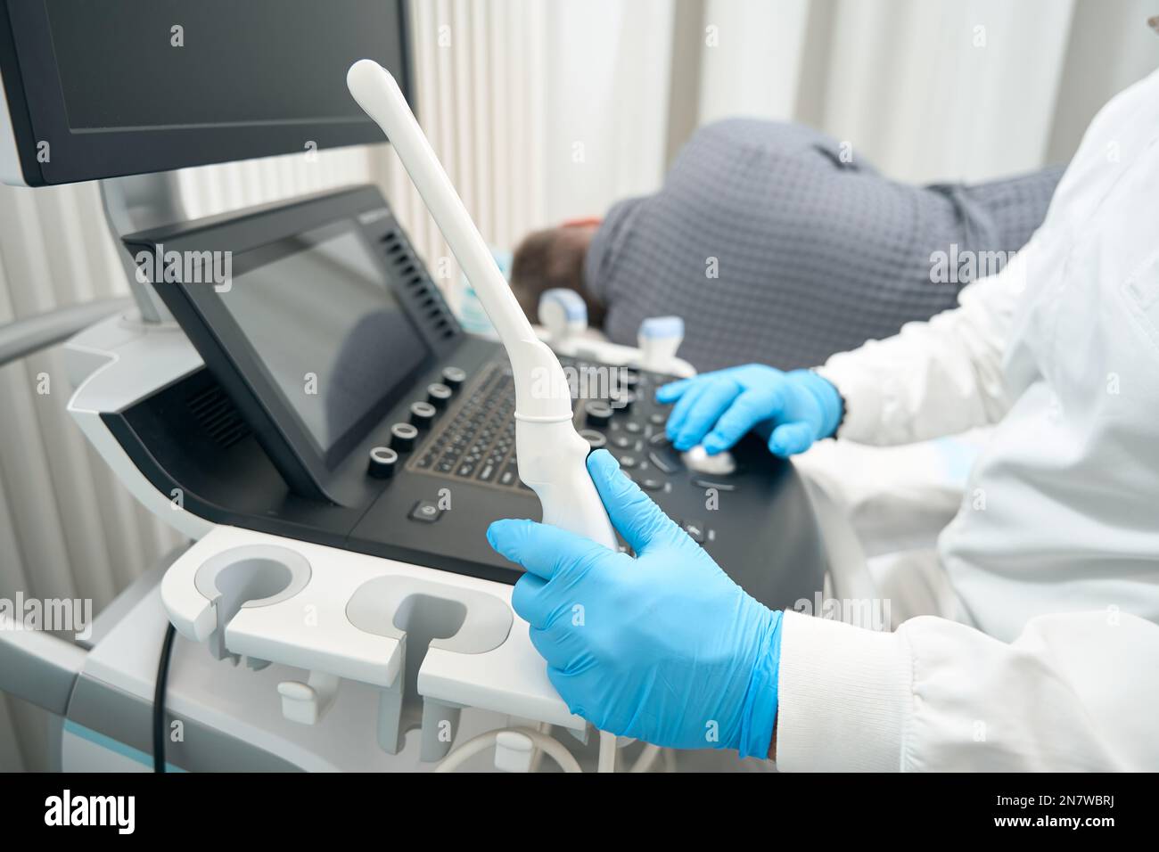 Specialist turn on medicine machine for diagnosis illness in hospital ...