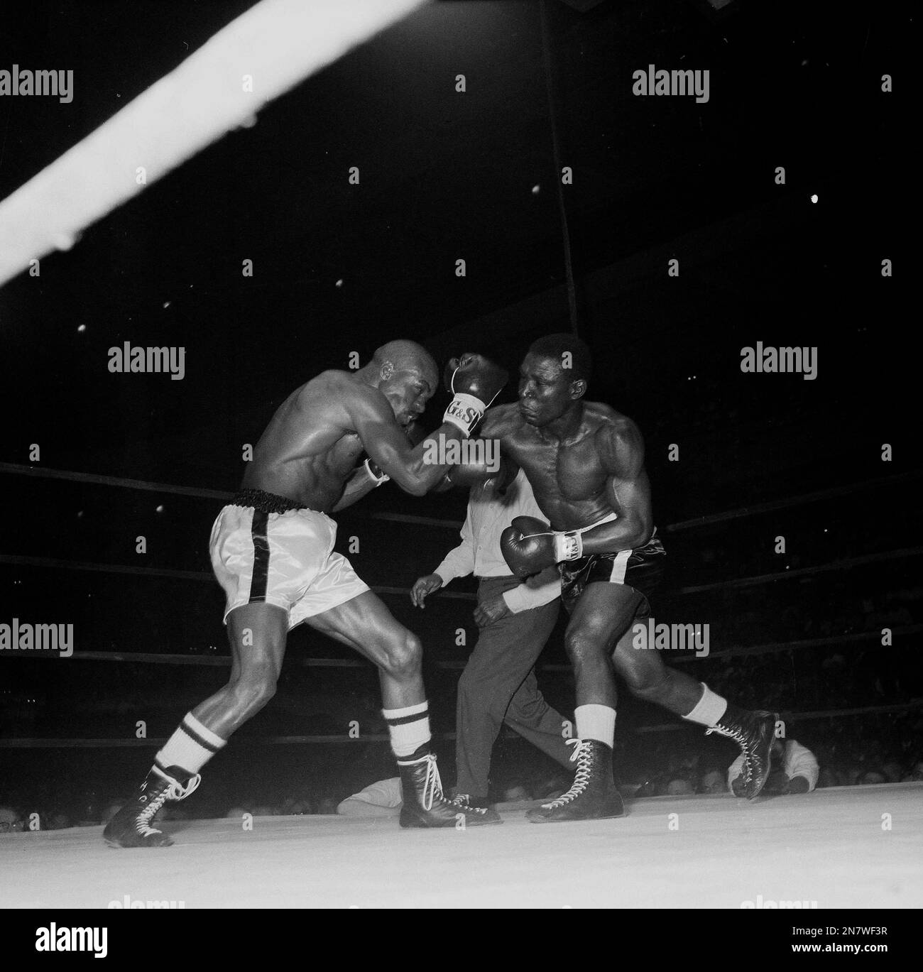 Nigeria's Dick Tiger and Rubin "Hurricane" Carter during their title ...