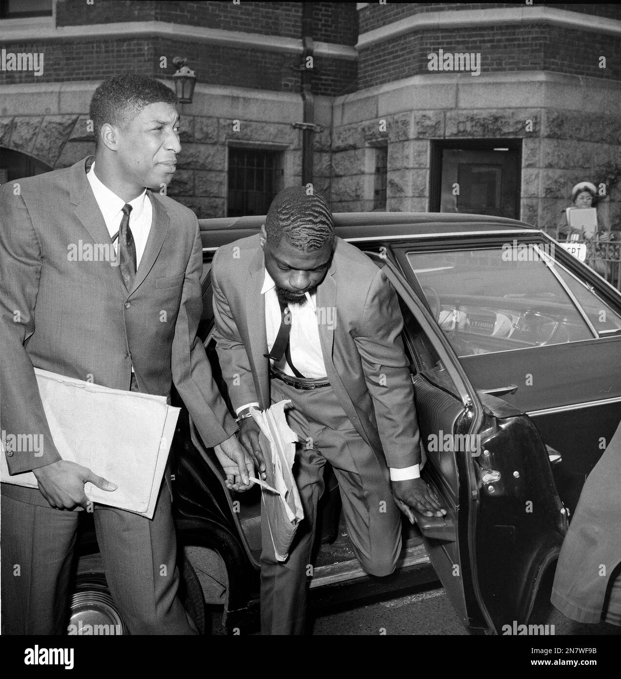 Co-defendants John Artis and Rubin "Hurricane" Carter, right, arrive at ...