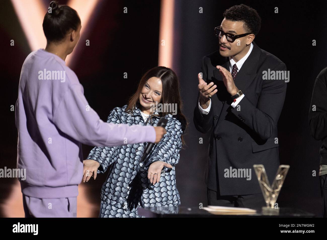 Stromae receives the Best Album award on stage with Coralie Barbier and ...