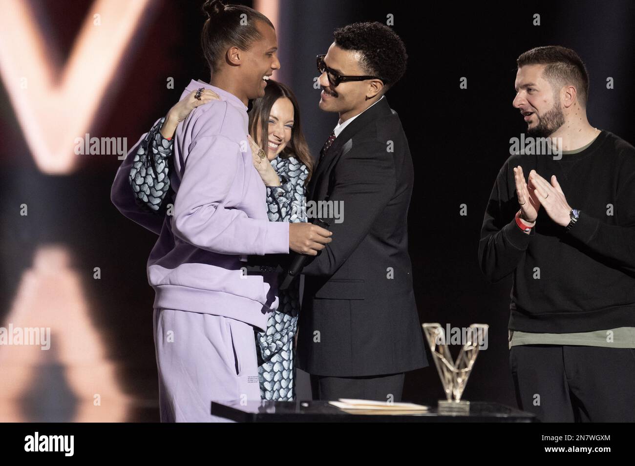 Stromae receives the Best Album award on stage with Coralie Barbier and ...
