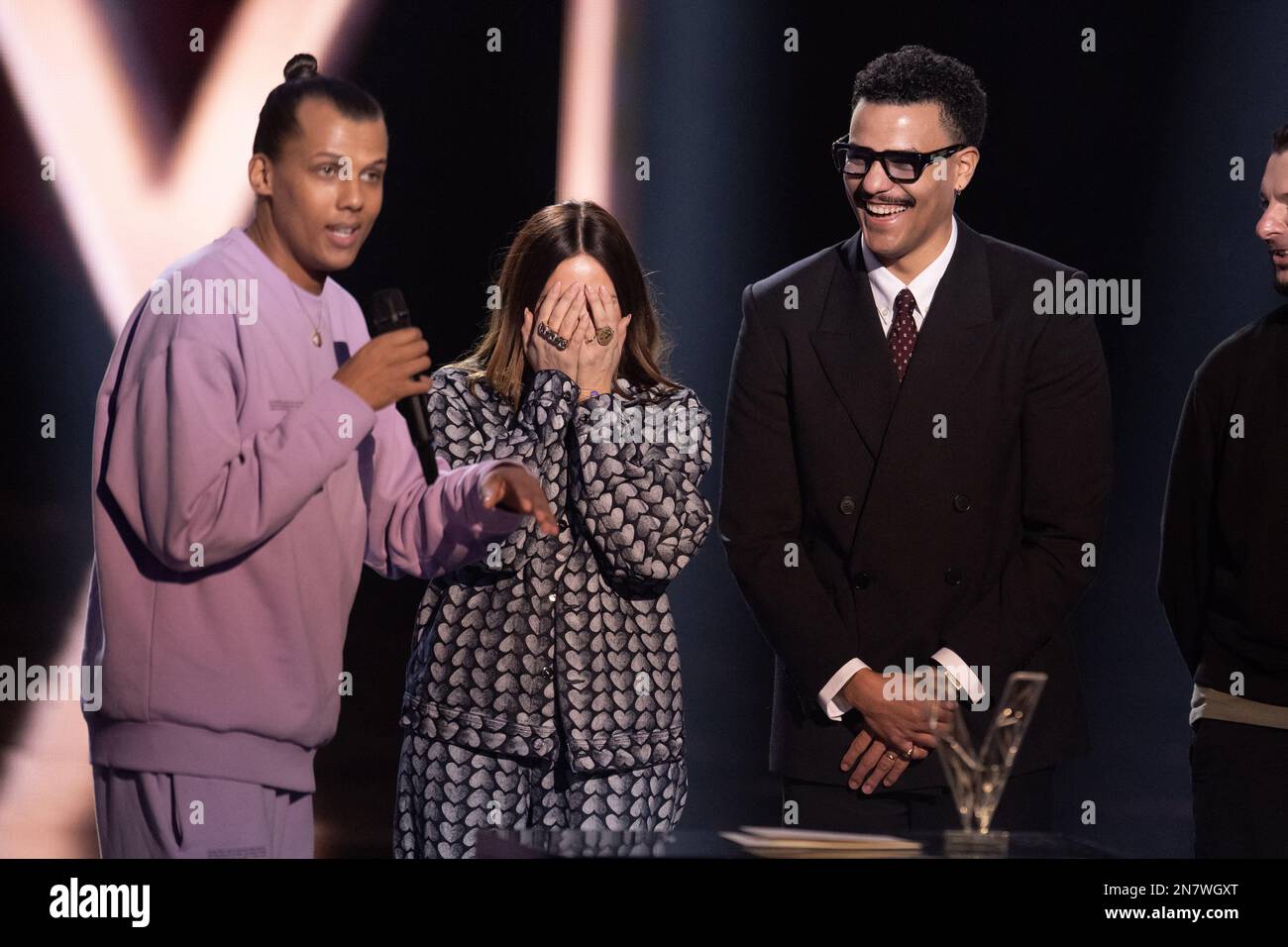 Stromae receives the Best Album award on stage with Coralie Barbier and ...