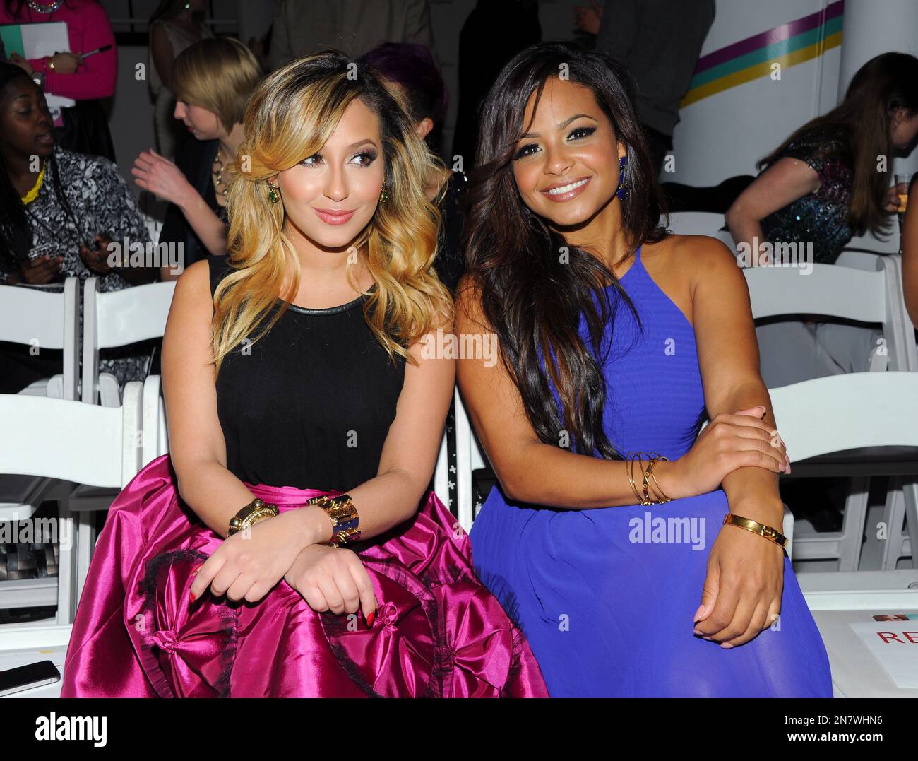 Singers Adrienne Bailon, left, and Christina Milian attend the P&G ...