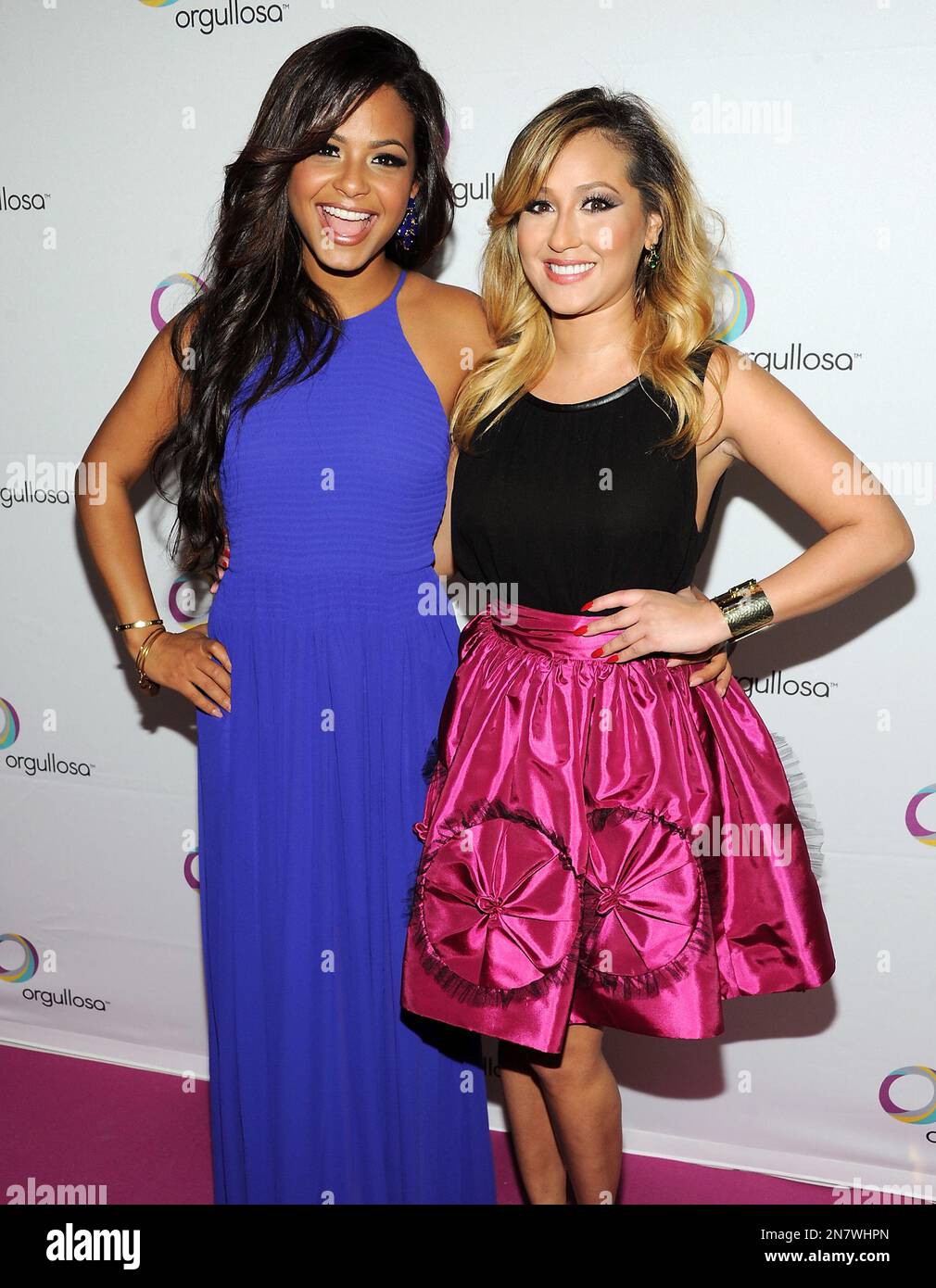 Singers Christina Milian, left, and Adrienne Bailon attend the P&G ...