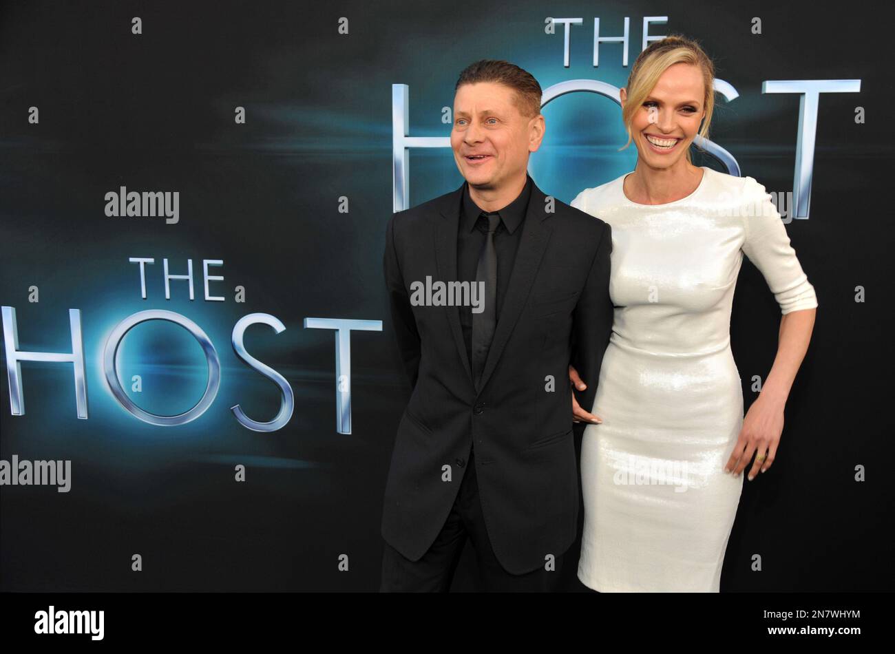 Andrew Niccol, writer/director of "The Host," poses with his wife ...