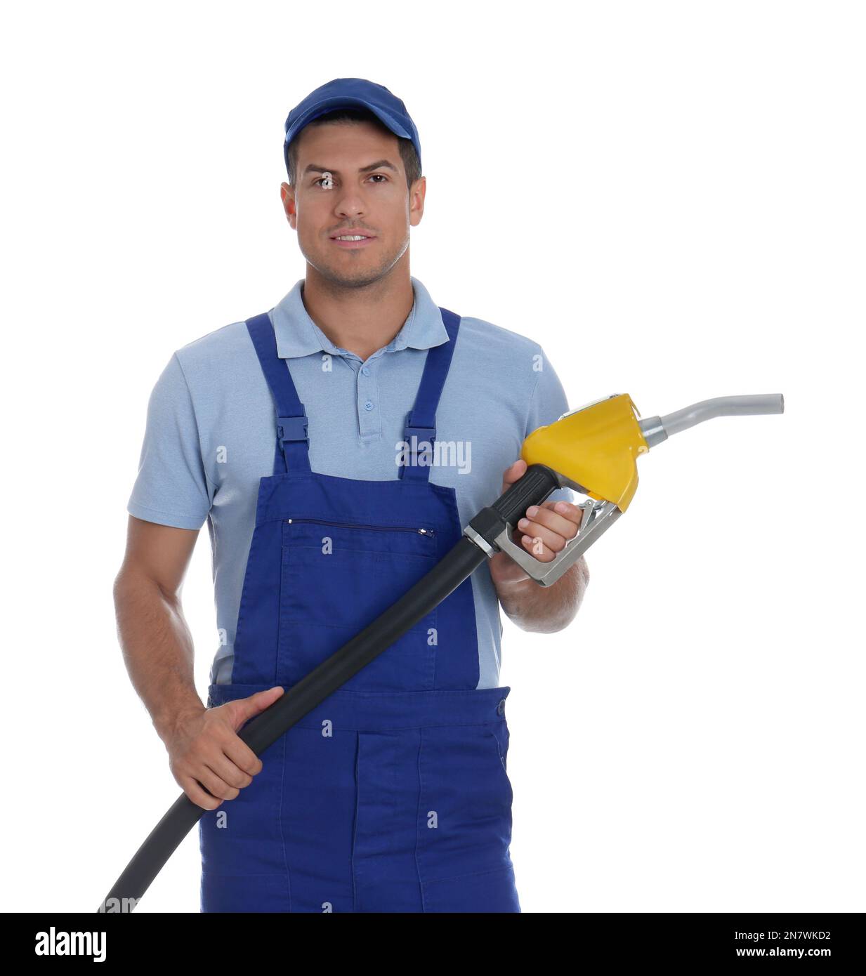 Gas station worker with fuel nozzle on white background Stock Photo - Alamy