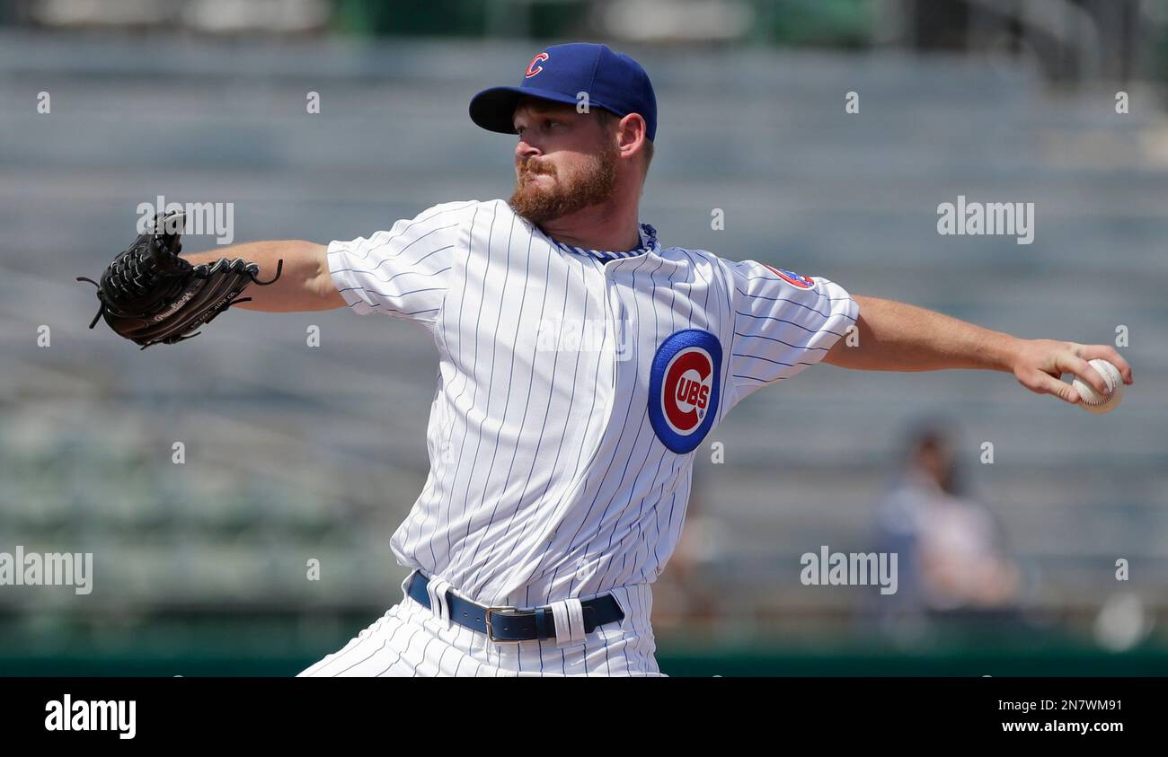 Chicago Cubs starting pitcher Travis Wood trows against Japan during ...