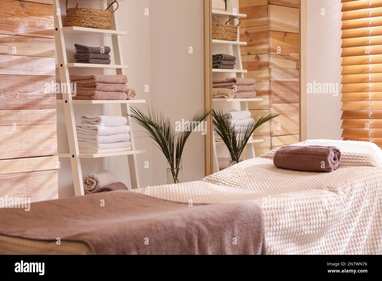 Stylish massage room interior in spa salon Stock Photo - Alamy