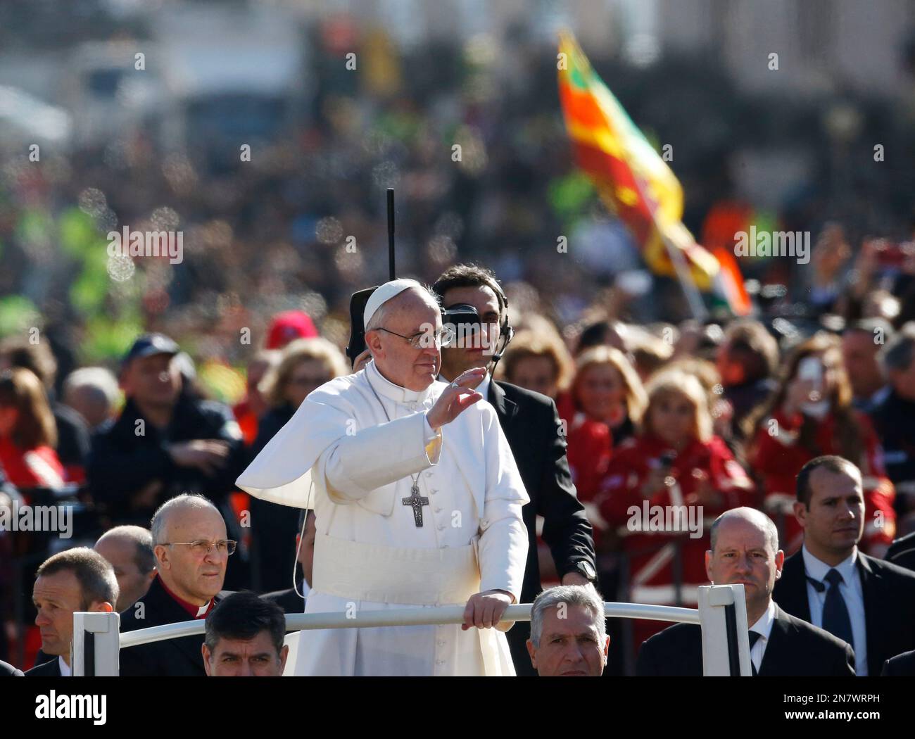 Pope Francis waves as he arrives in St. Peter's Square for his ...