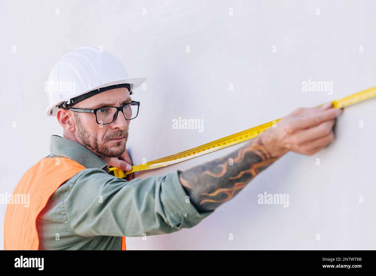 construction worker engineer male professional look working measure ...