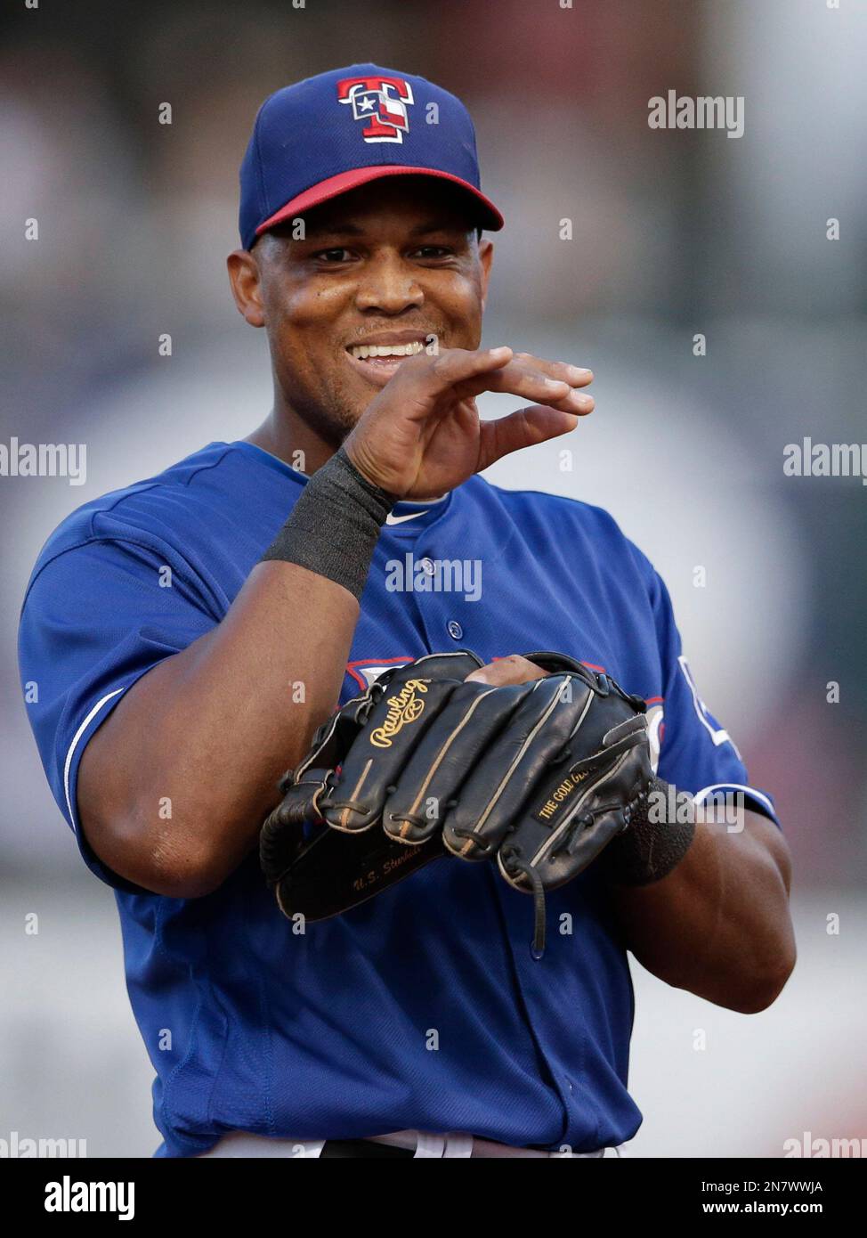 Texas Rangers third baseman Adrian Beltre jokes with members of the ...