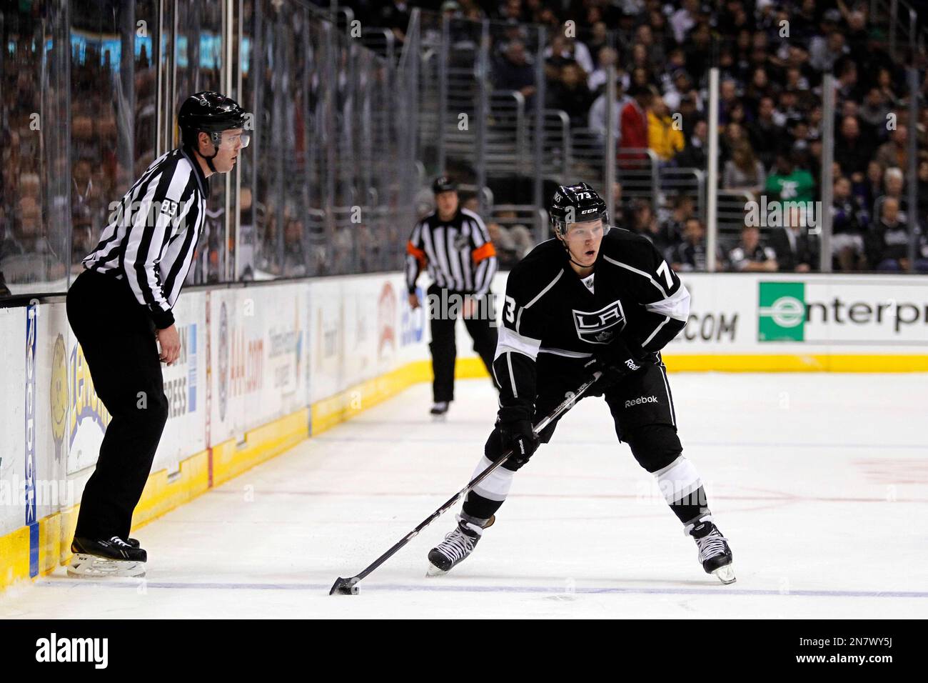Los Angeles Kings center Tyler Toffoli (73) takes the puck up ice ...