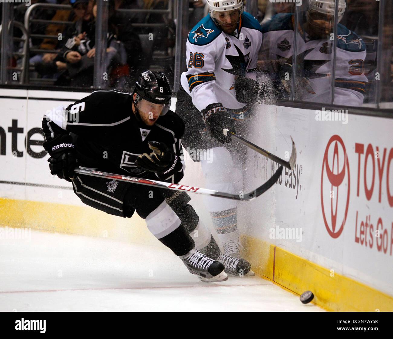 Los Angeles Kings defenseman Jake Muzzin (6) defends against San Jose ...