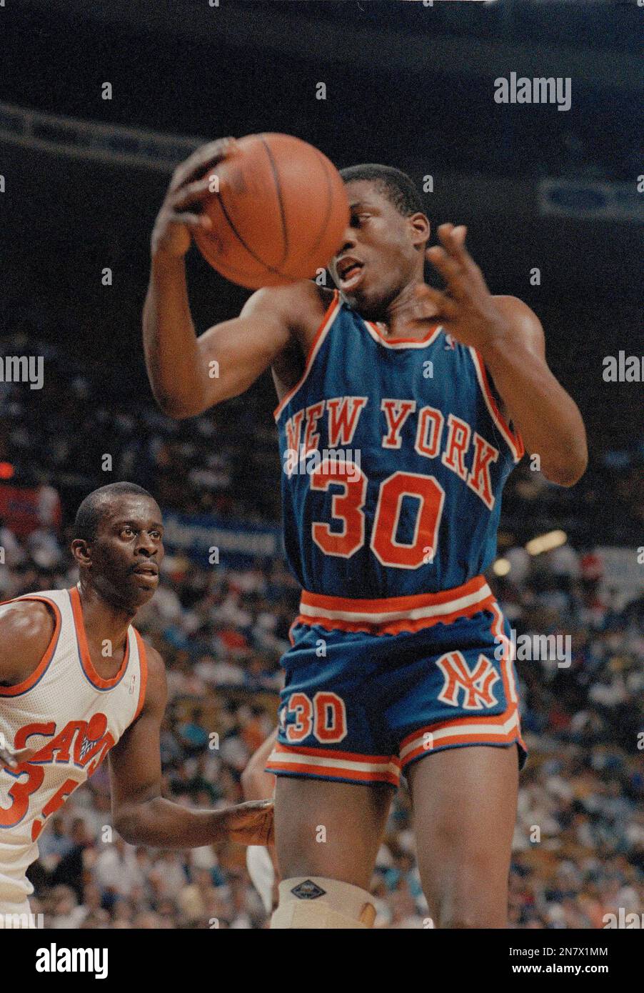 New York Knicks' Bernard King (30) grabs an errant pass as he is ...