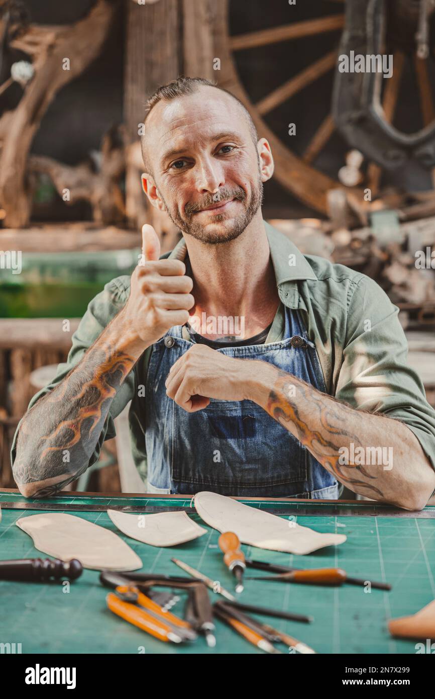 portrait happy artist leather handcraft working at own workshop small ...