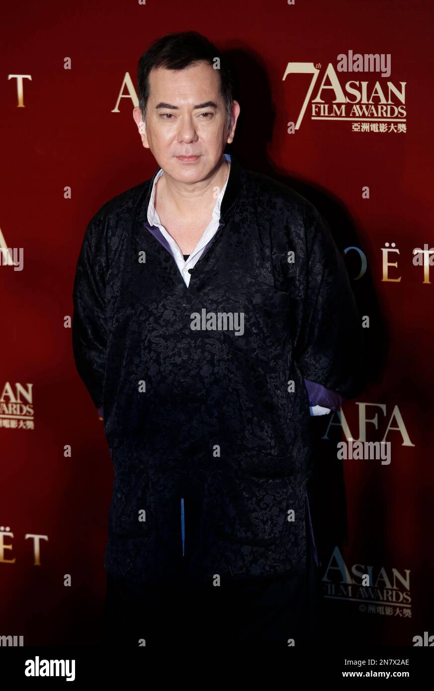 Hong Kong actor Anthony Wong poses on the red carpet at the Asian Film ...
