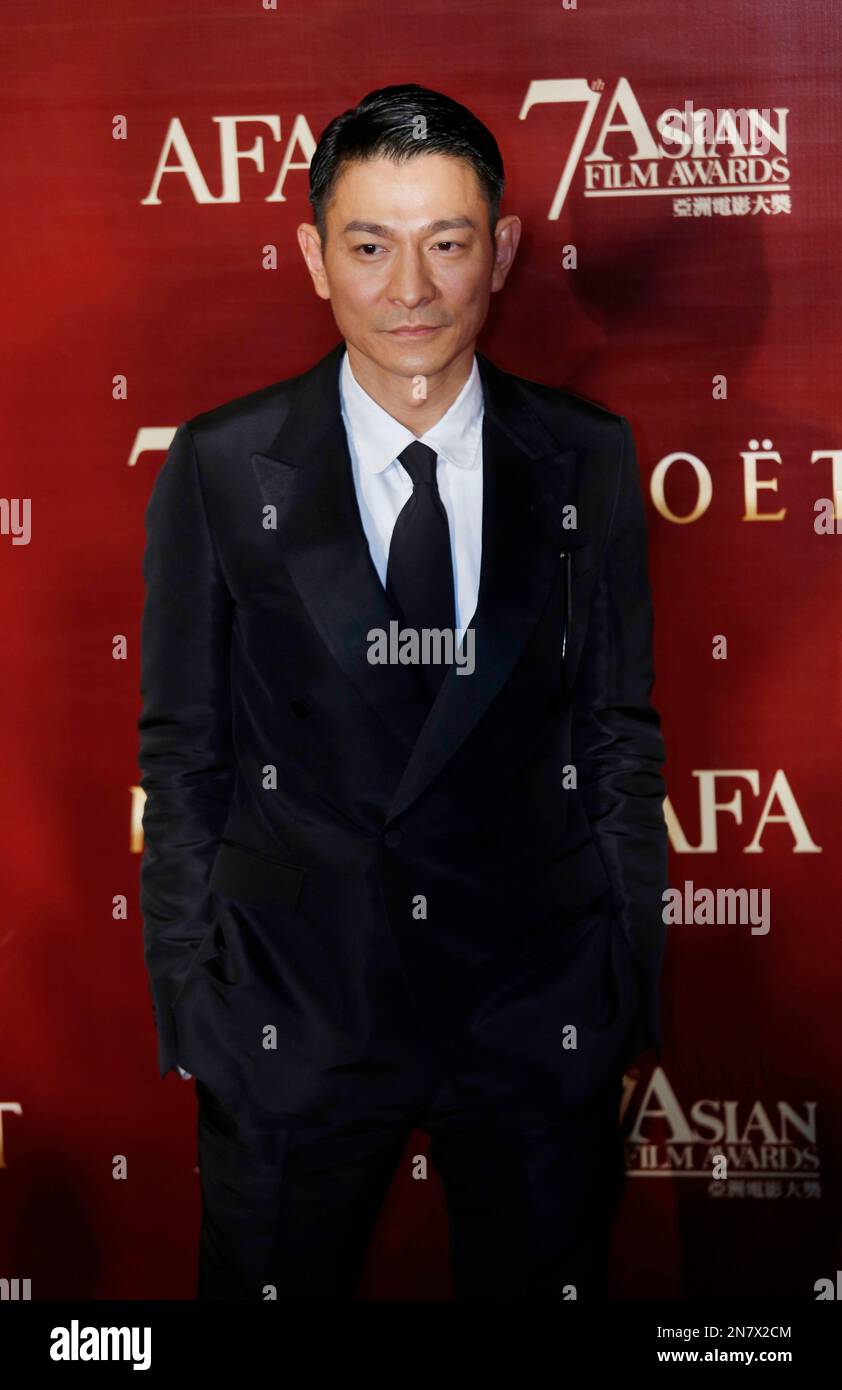 Hong Kong actor Andy Lau poses on the red carpet at the Asian Film ...
