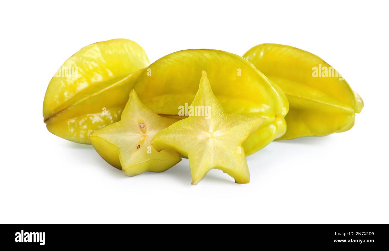 Cut and whole carambolas on white background Stock Photo - Alamy