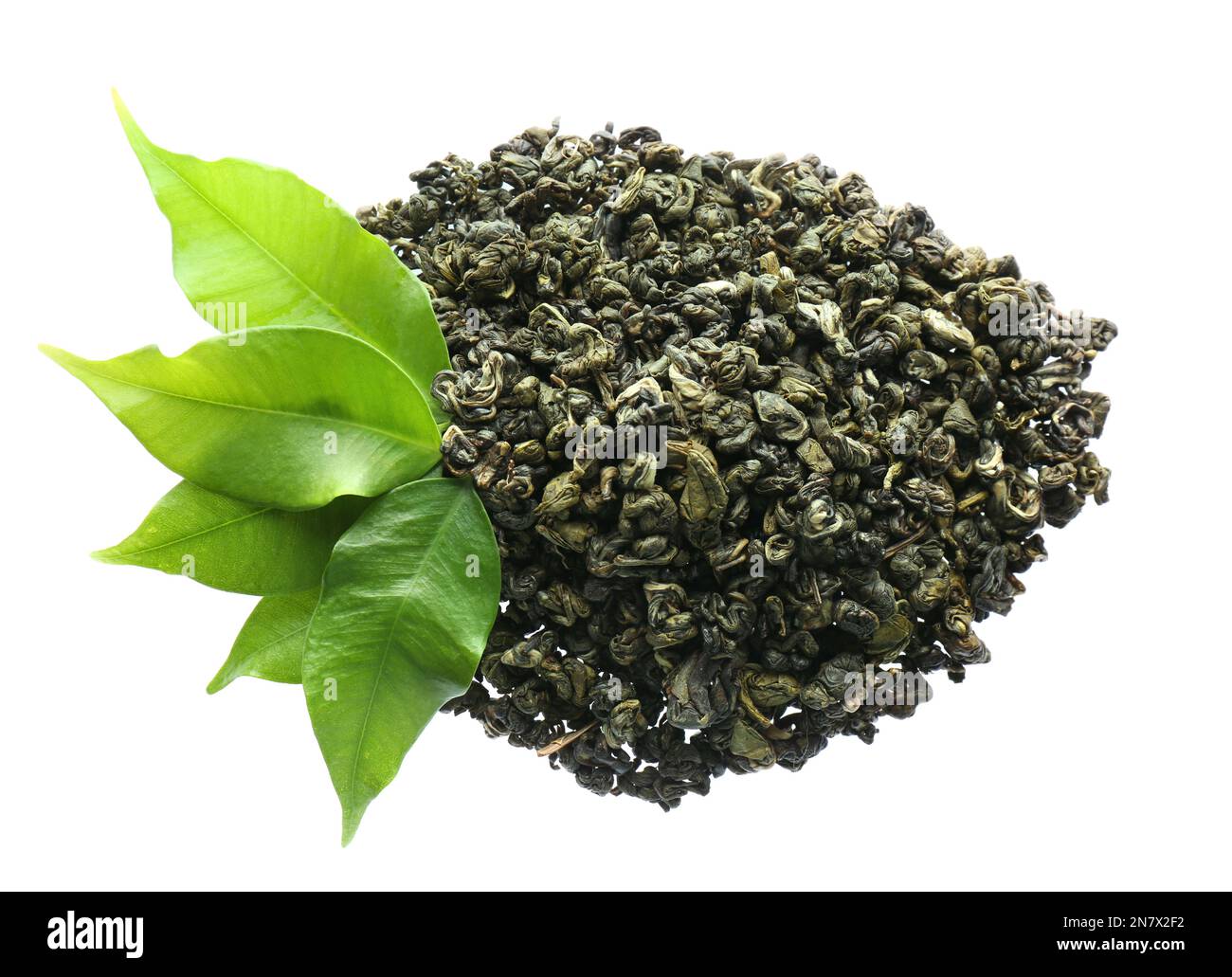 Pile of dried green tea leaves on white background, top view Stock ...