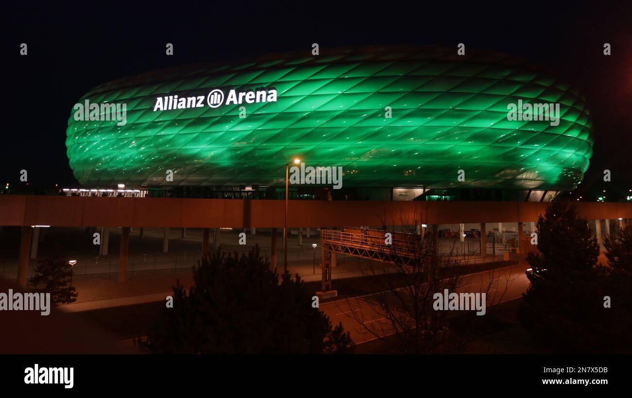 The Bayern Munich soccer stadium 'Allianz Arena' is illuminated in ...