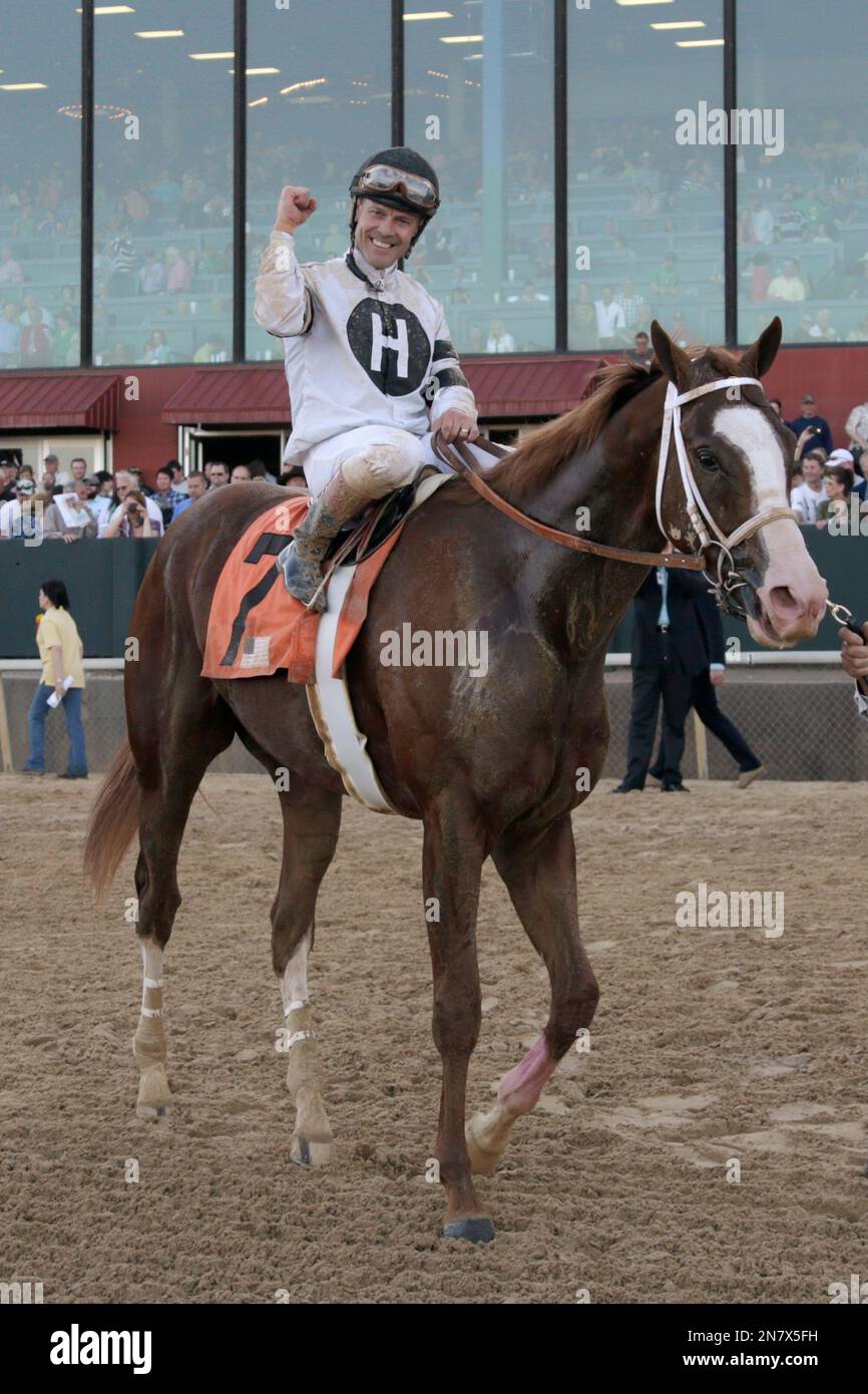 Will Take Charge and jockey Jon Court are led to the winners circle ...