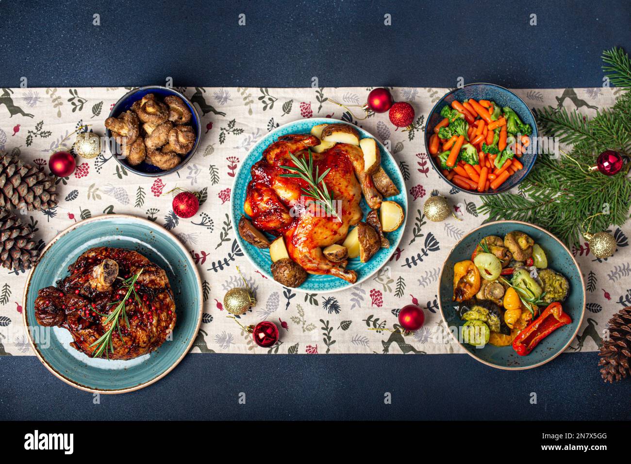 Christmas table top view with festive food with baked turkey or chicken ...