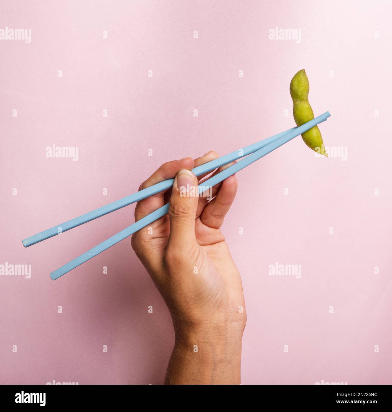 Hand holding tuna hi-res stock photography and images - Alamy