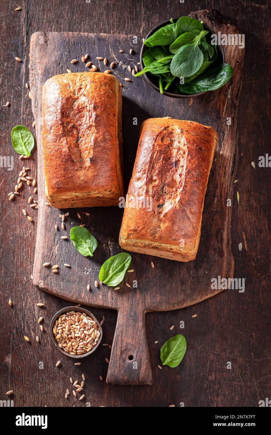 Fresh spinach bread baked in a home oven. Bread made from grains and ...